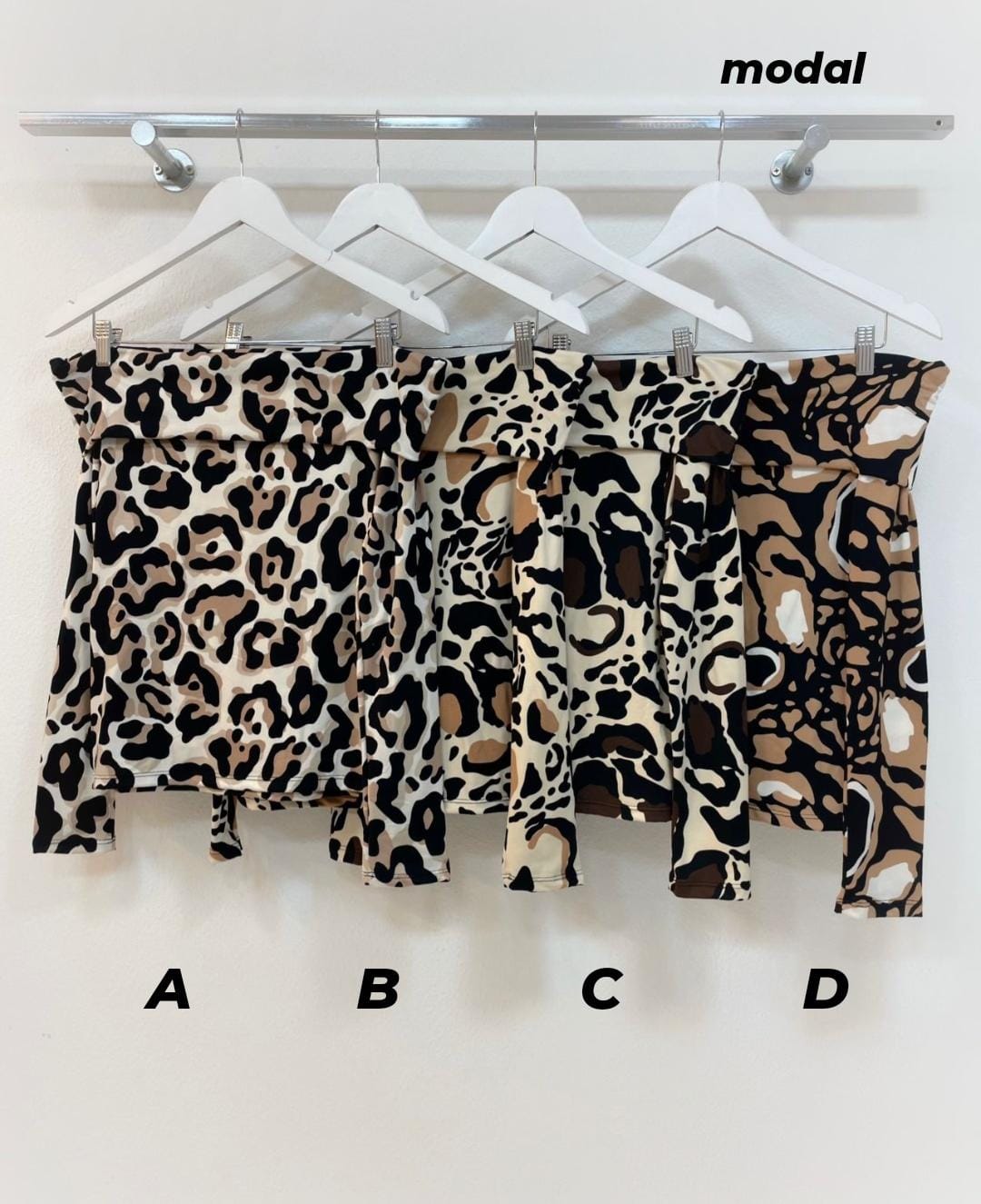 Remera off shoulder animal print | Distrito Moda